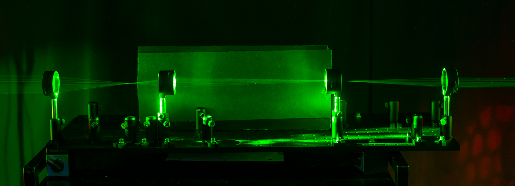Invisibility cloaking device hides objects across range of angles